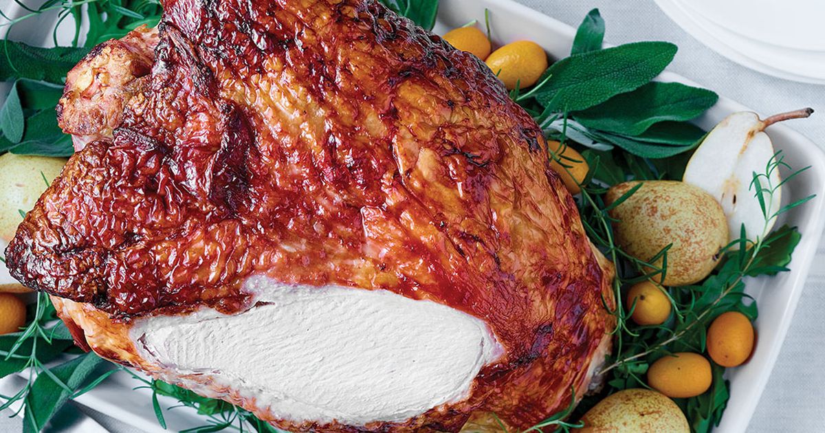 Seasoned uncooked turkey breast with back and boneless wing drummettes ...